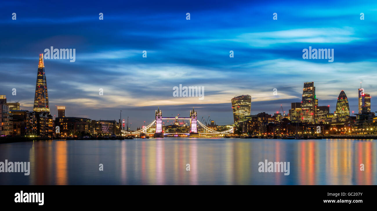 Panoramic view of illuminated London cityscape at sunset Stock Photo ...