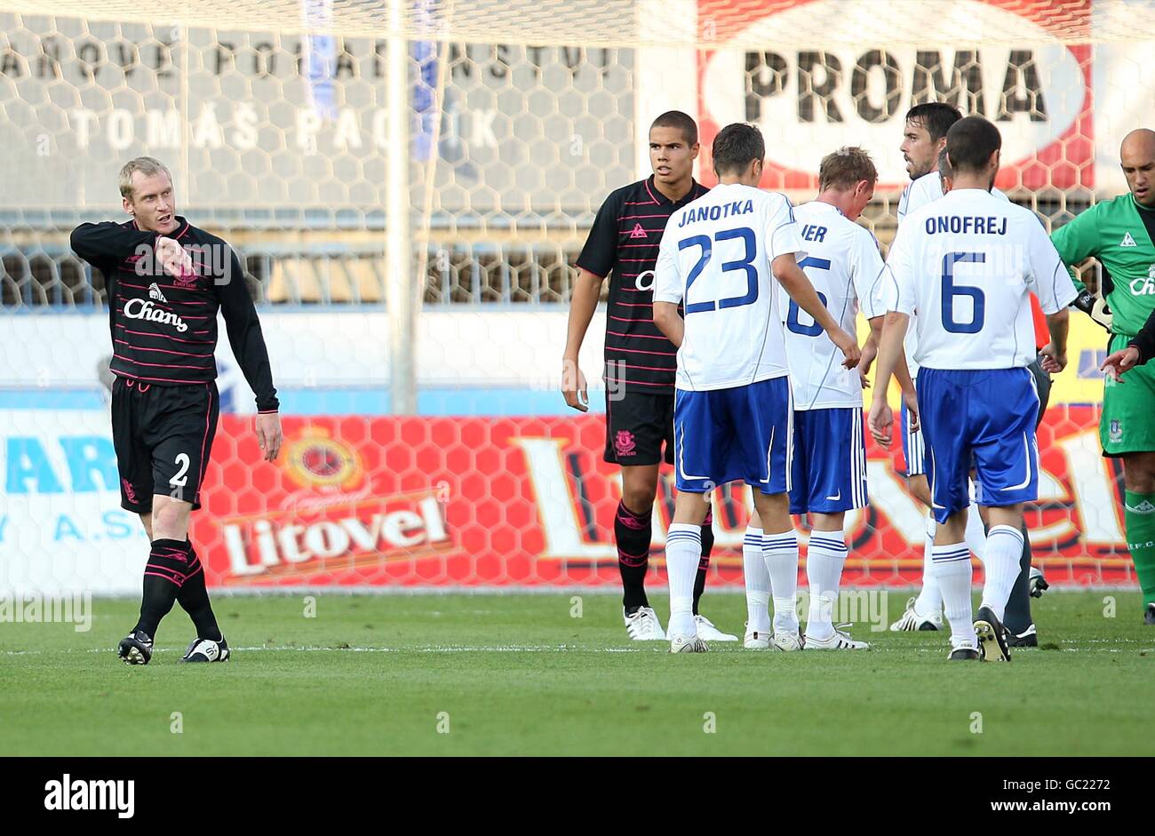Everton's Tony Hibbert is shown a straight red card for fouling Sigma ...
