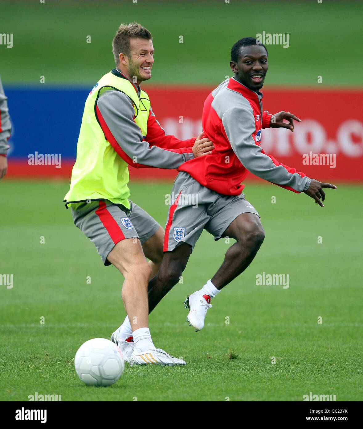 England's David Beckham (L) and Shaun Wright-Phillips in action during ...