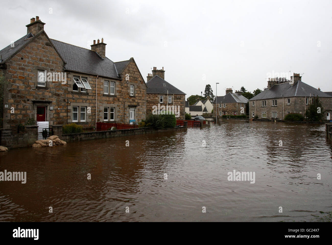 Flooding in a street in Elgin after the River Lossie burst in banks ...