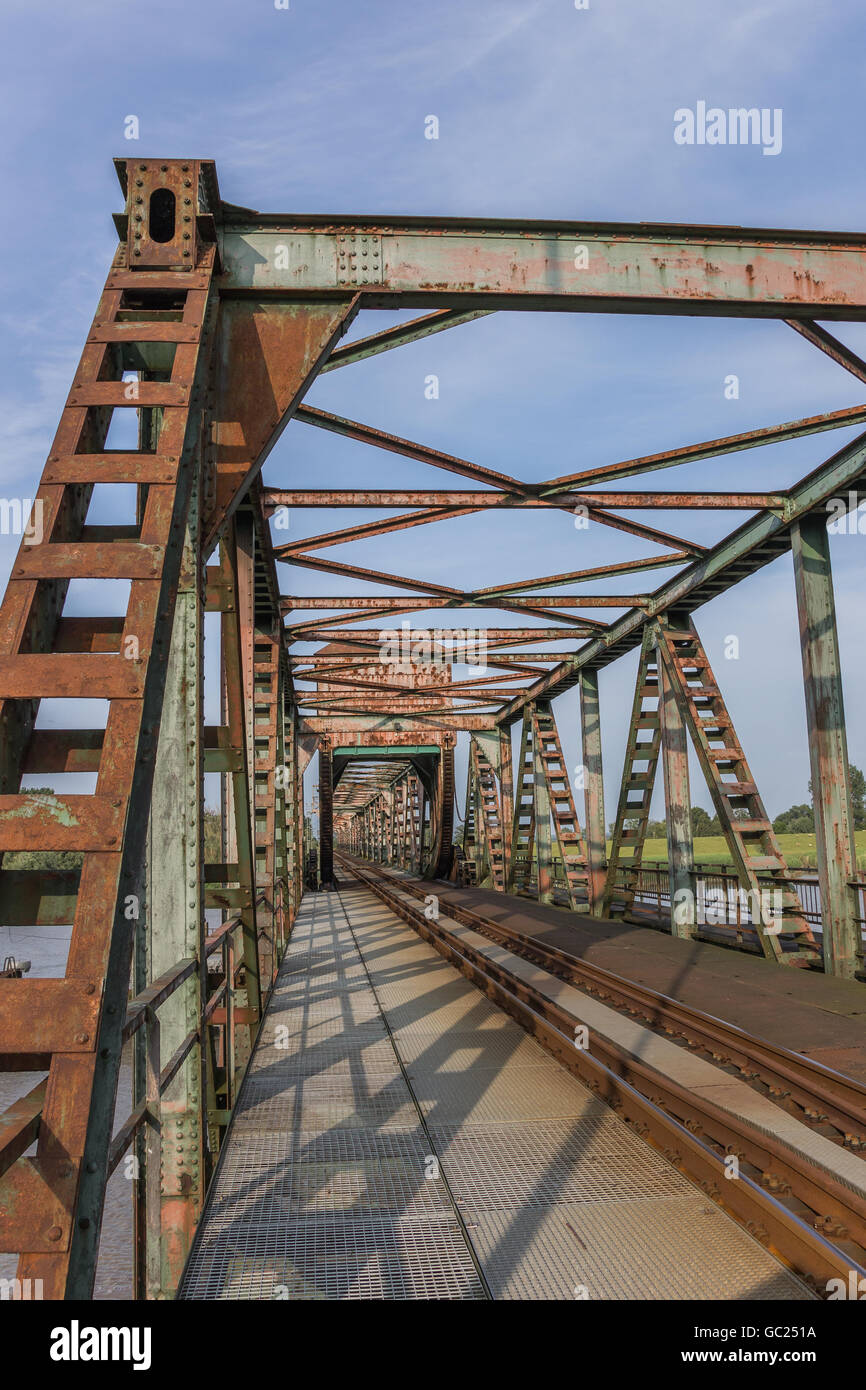 Rusty old steel railroad bridge Friesenbrucke close to Weener in ...