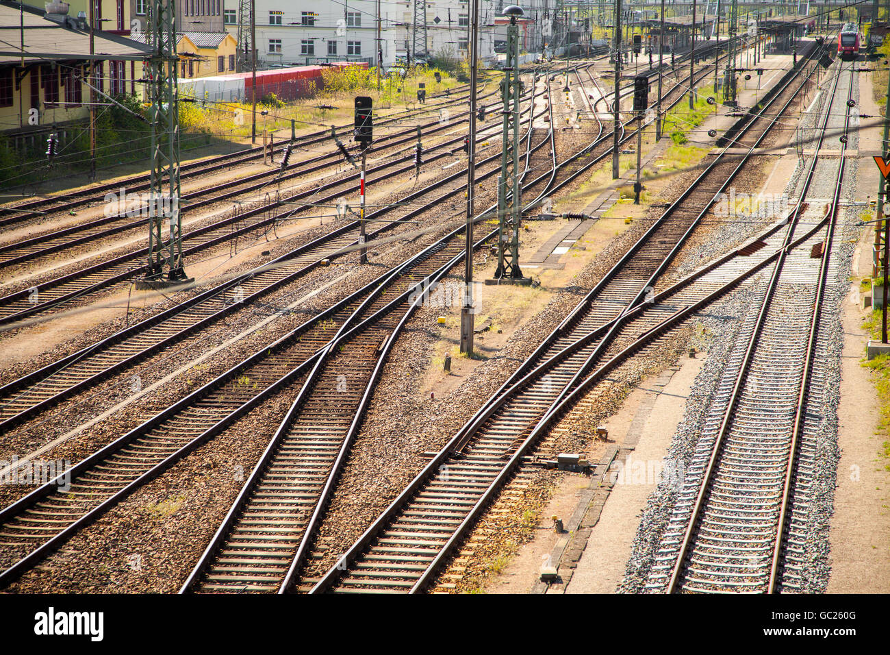 railroad tracks on train station Stock Photo - Alamy