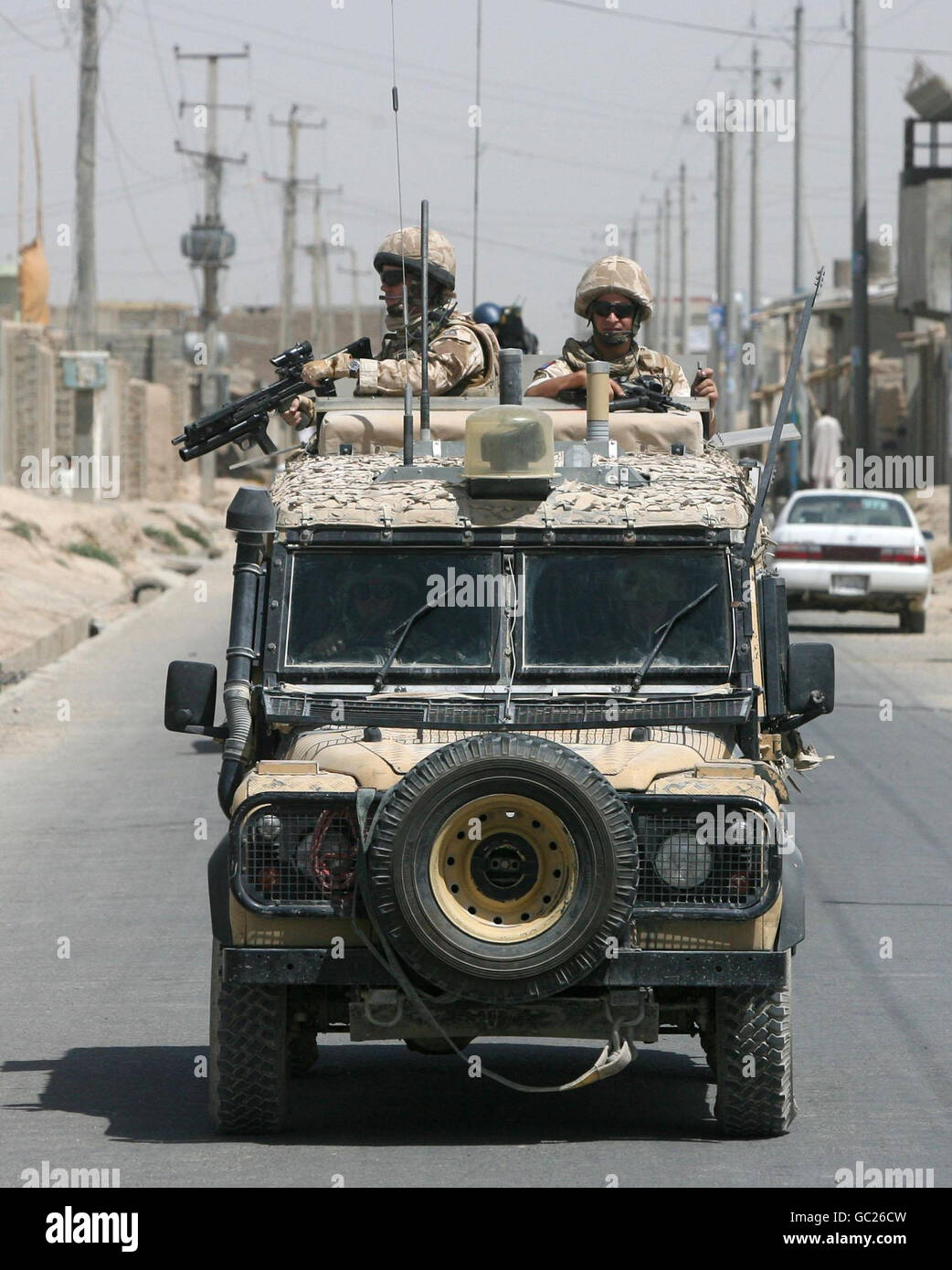 Members of The 40th Regiment The Royal Artillery in a snatch Land Rover ...
