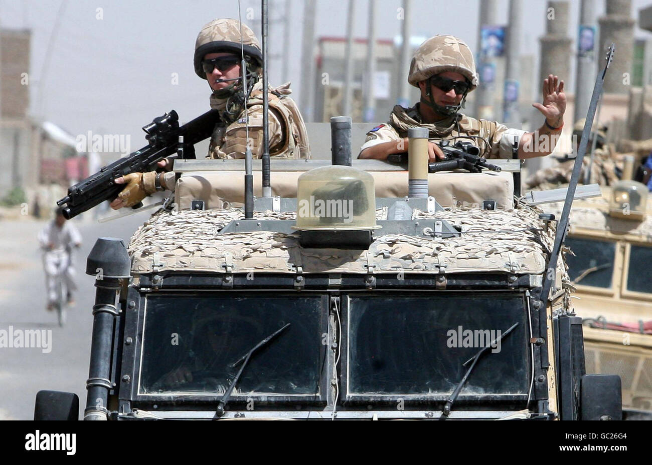 Members of The 40th Regiment The Royal Artillery in a snatch Land Rover ...
