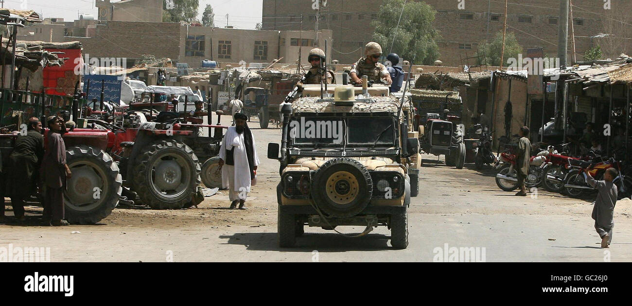 Members of The 40th Regiment The Royal Artillery in a snatch Land Rover ...