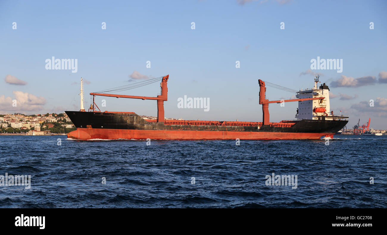 A cargo ship carrying goods between ports Stock Photo - Alamy