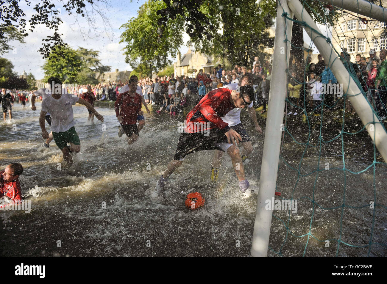 River Windrush football game Stock Photo - Alamy