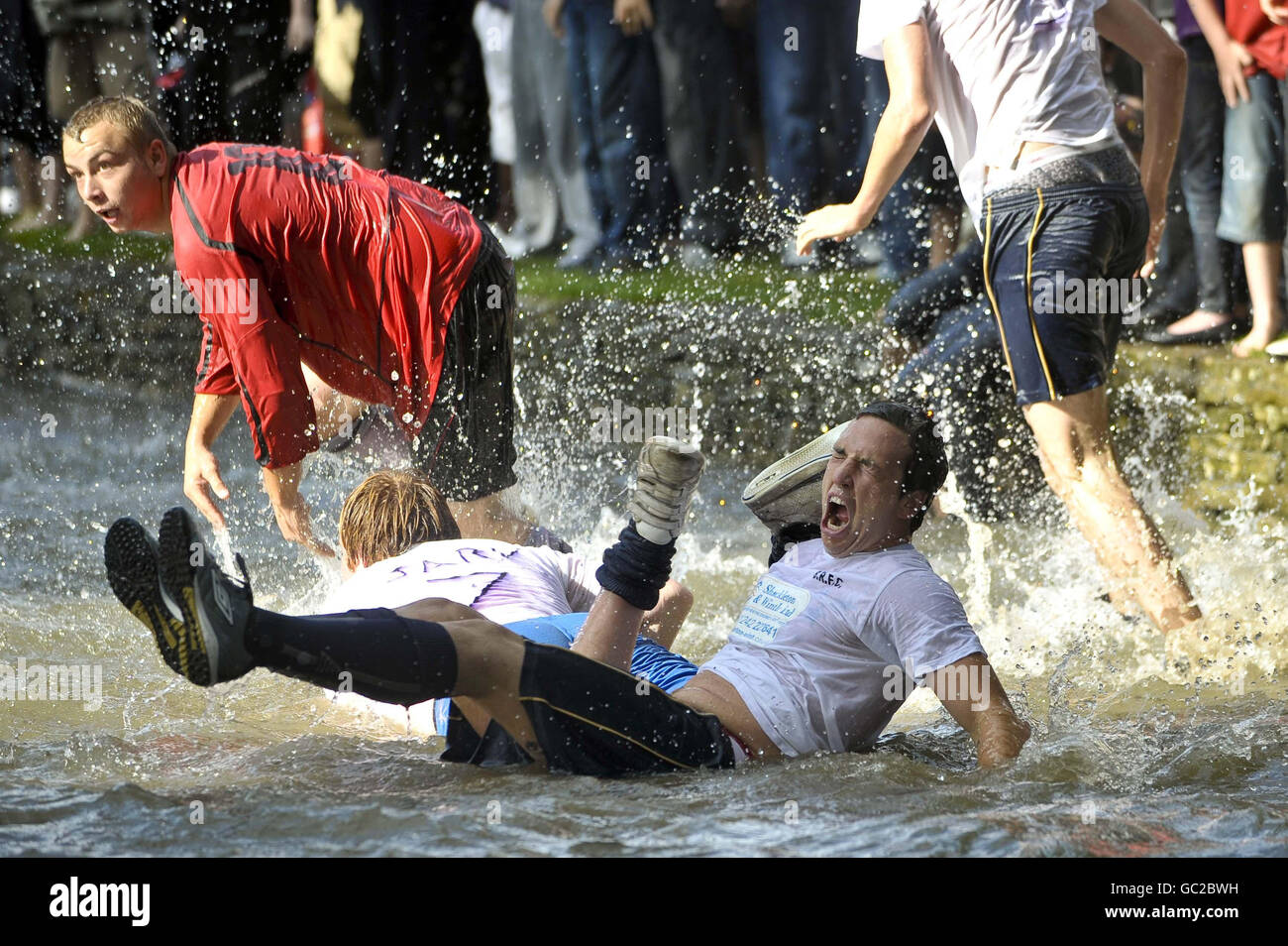 River Windrush football game Stock Photo - Alamy