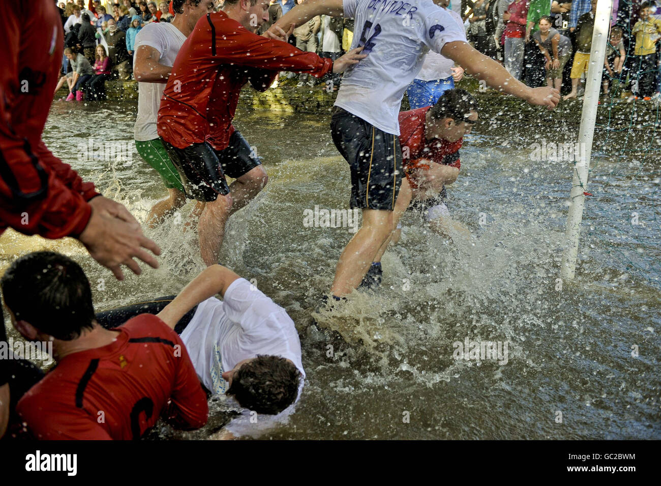 River Windrush football game Stock Photo - Alamy