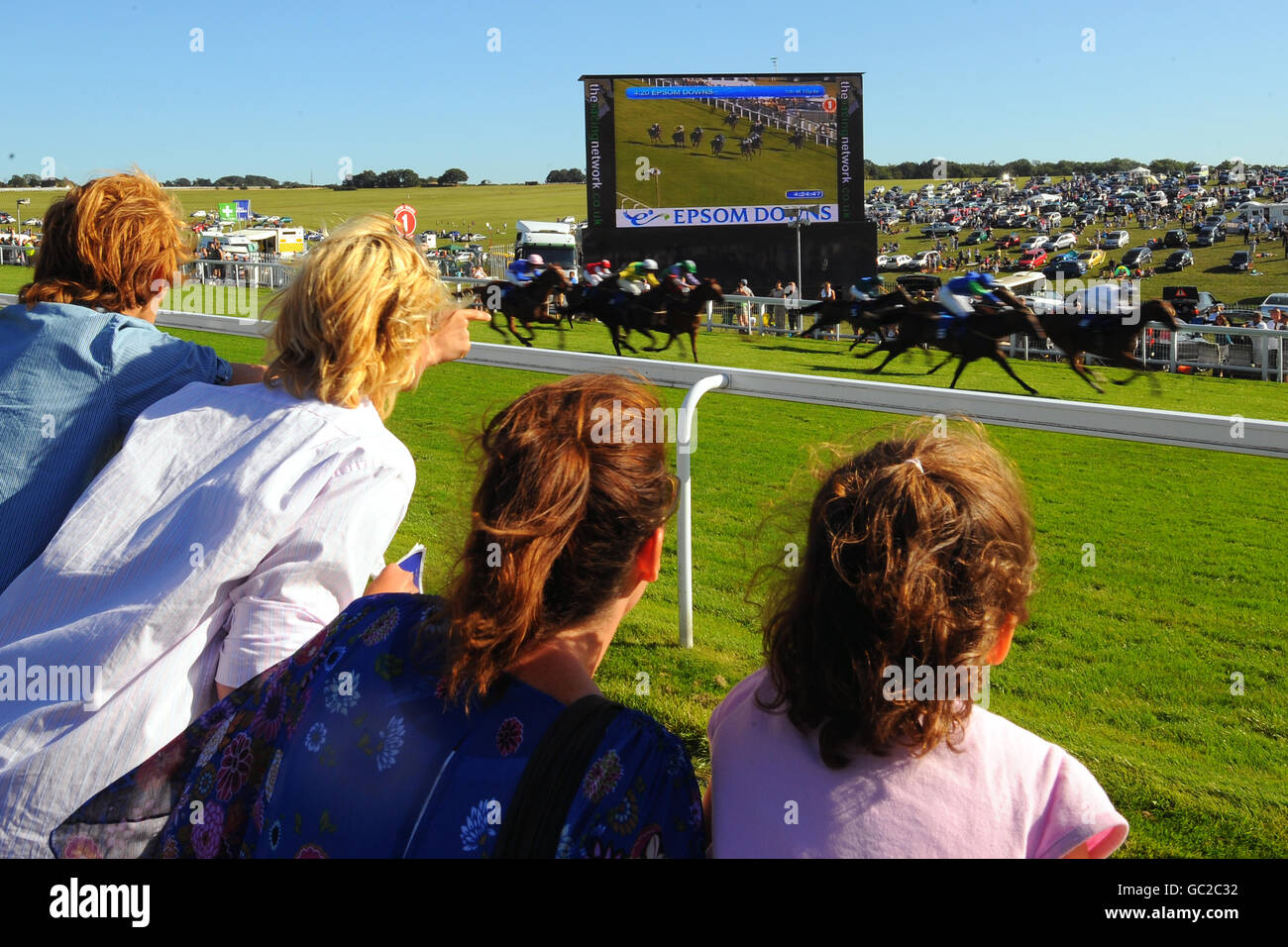 Racegoers enjoy the family fun day at epsom downs racecourse hi-res ...