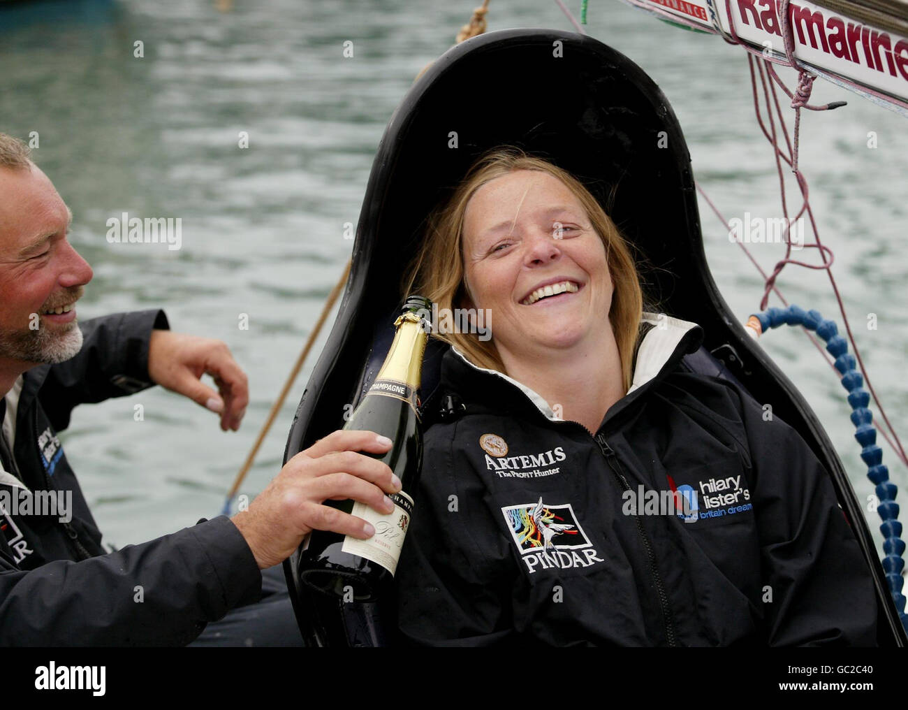 Disabled yachtswomen Hilary Lister enjoys a bottle of Champagne with ...