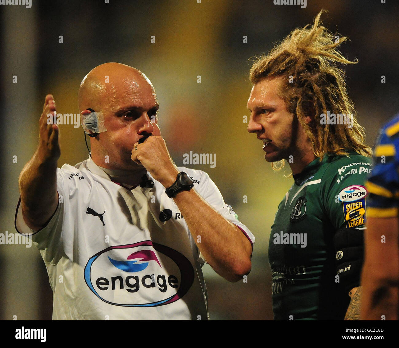 St Helens' Sean Long speaks to referee Phil Bentham (left) during the ...