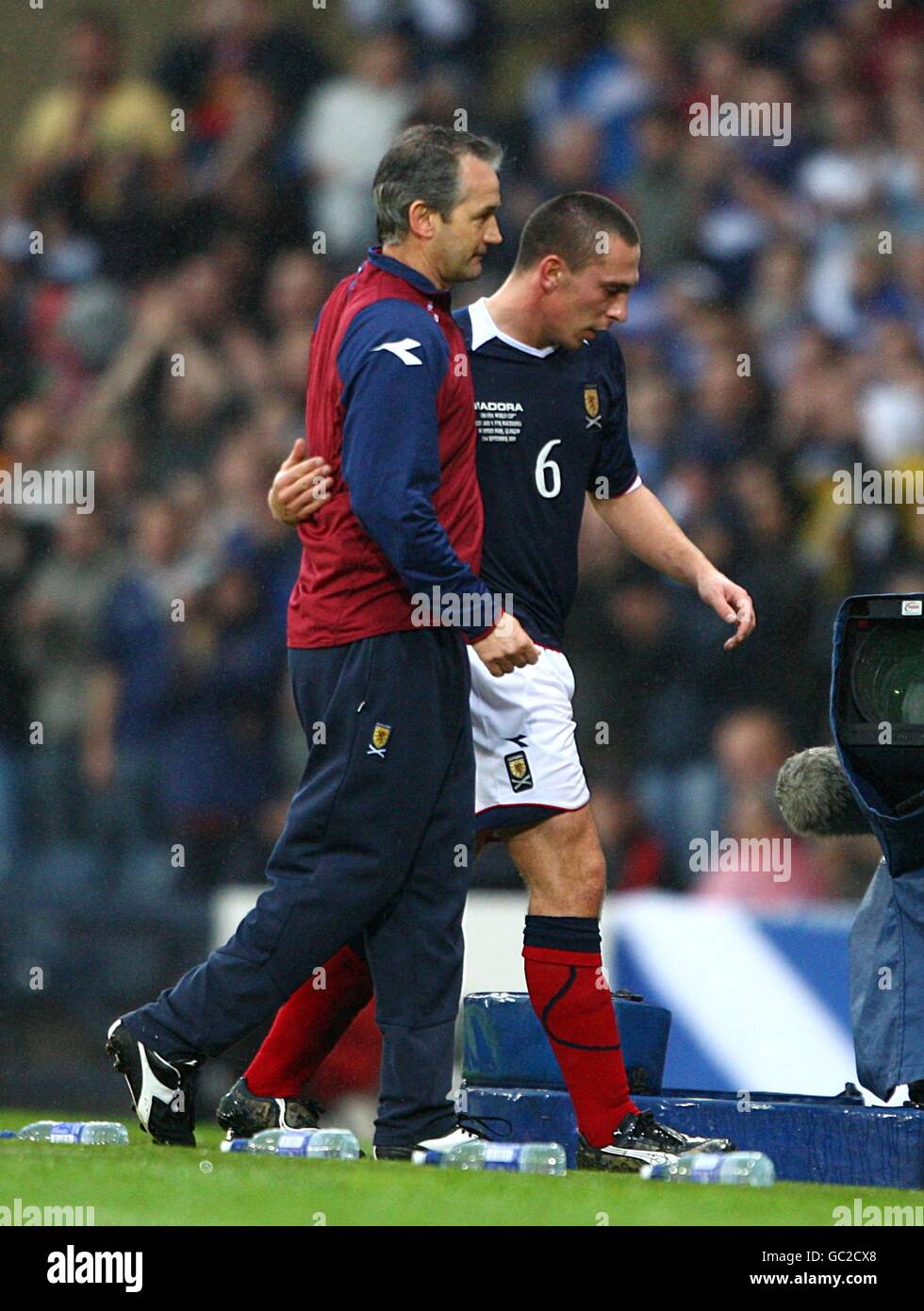Scotland's Scott Brown (left) is thanked by manager George Burley after ...