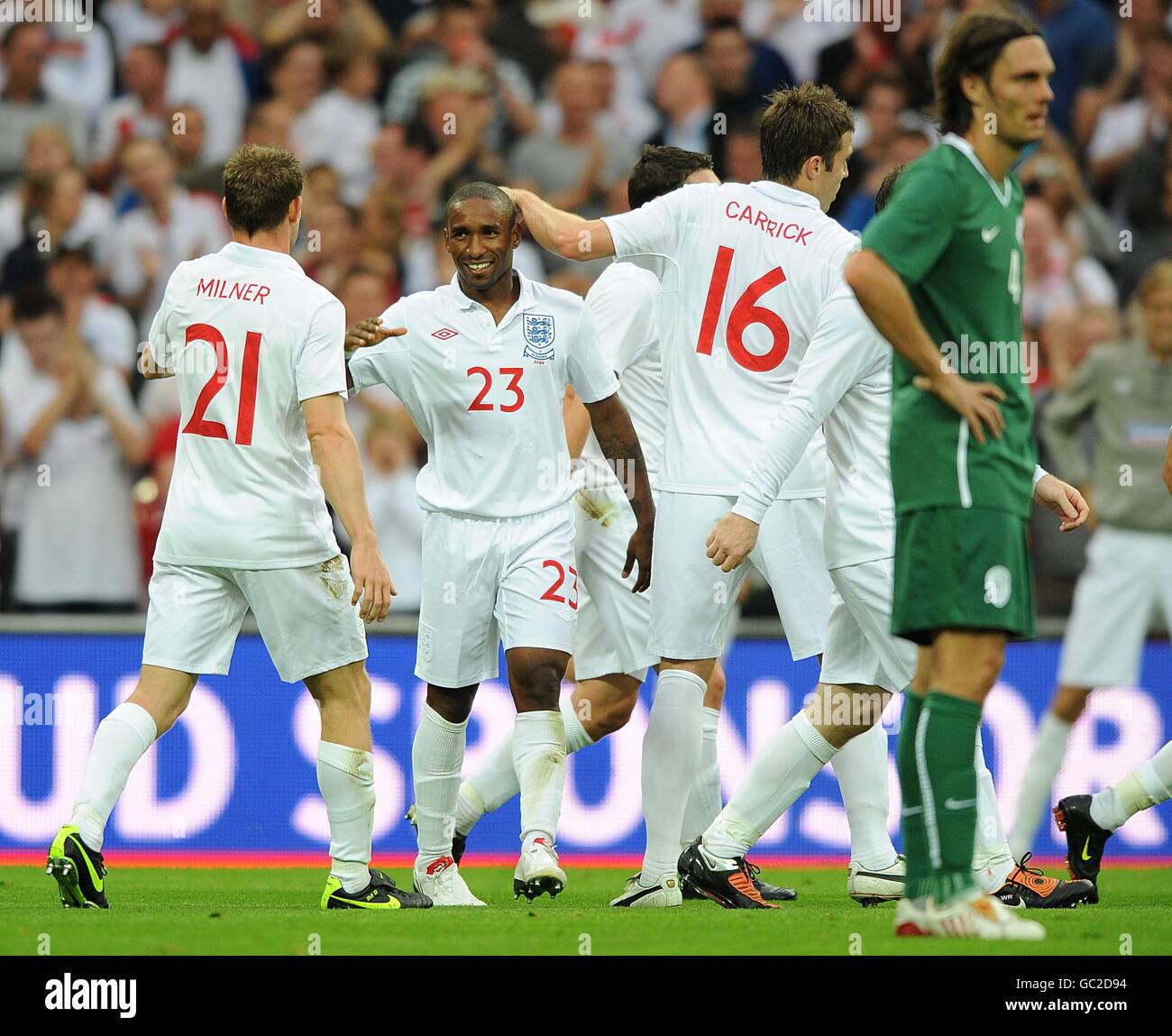 England's Jermain Defoe (centre) celebrates with his team mates Aaron ...