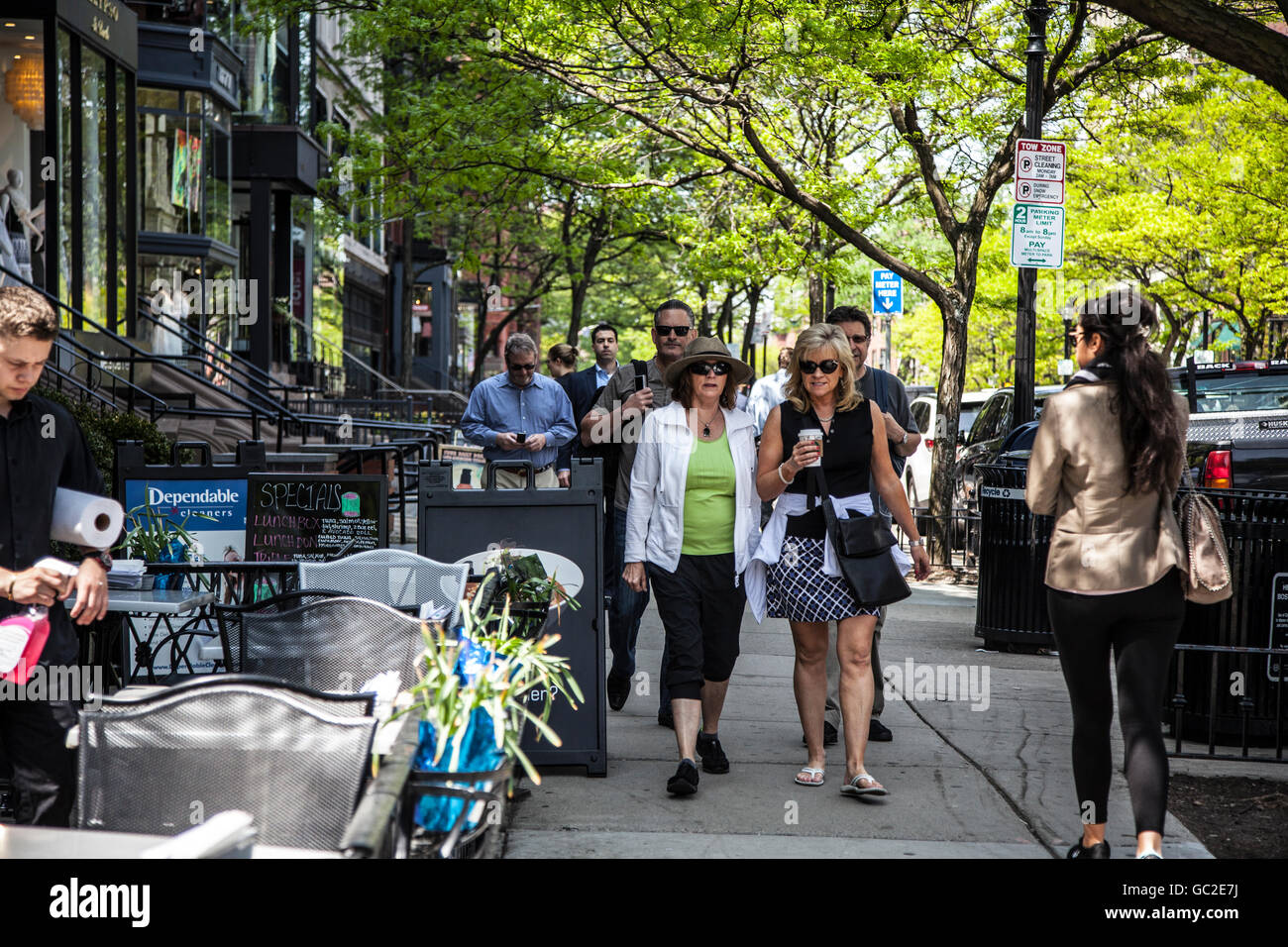 People walking at Newbury Street in Boston, It is a mile long street ...