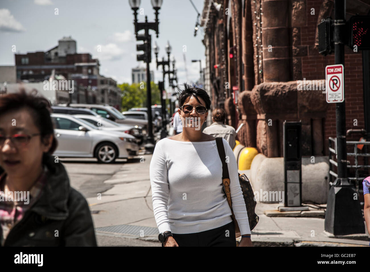 People walking at Newbury Street in Boston, It is a mile long street ...