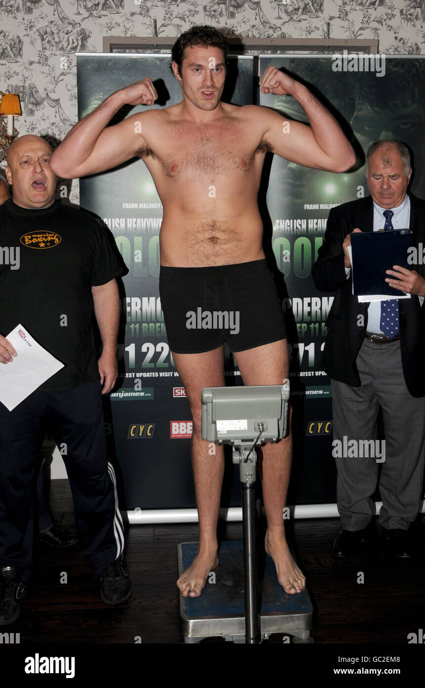 Tyson Fury poses on the scales during the Weigh In at The Bickley ...