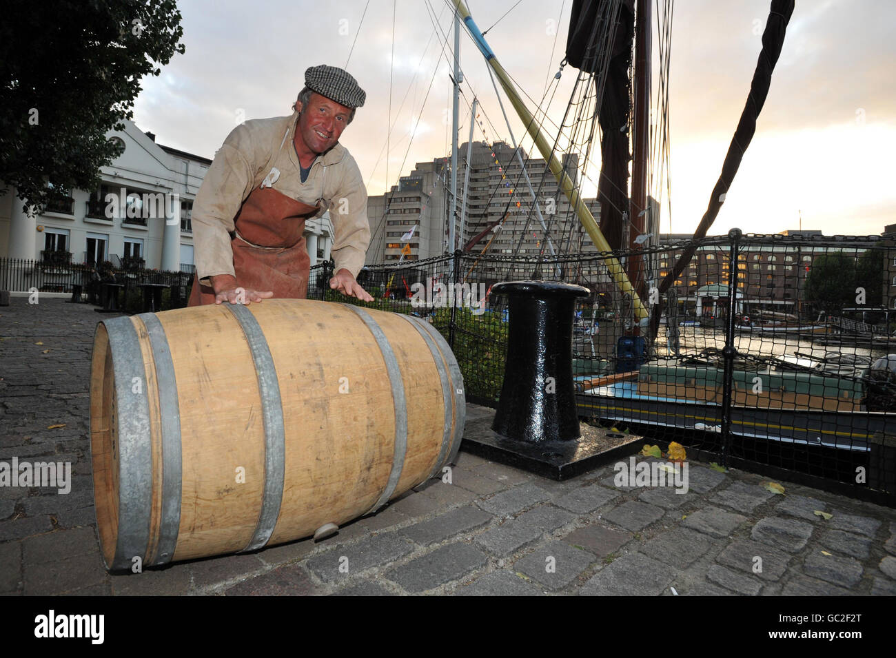 Rolls barrels along jetty st katherines dock in london hi-res stock ...