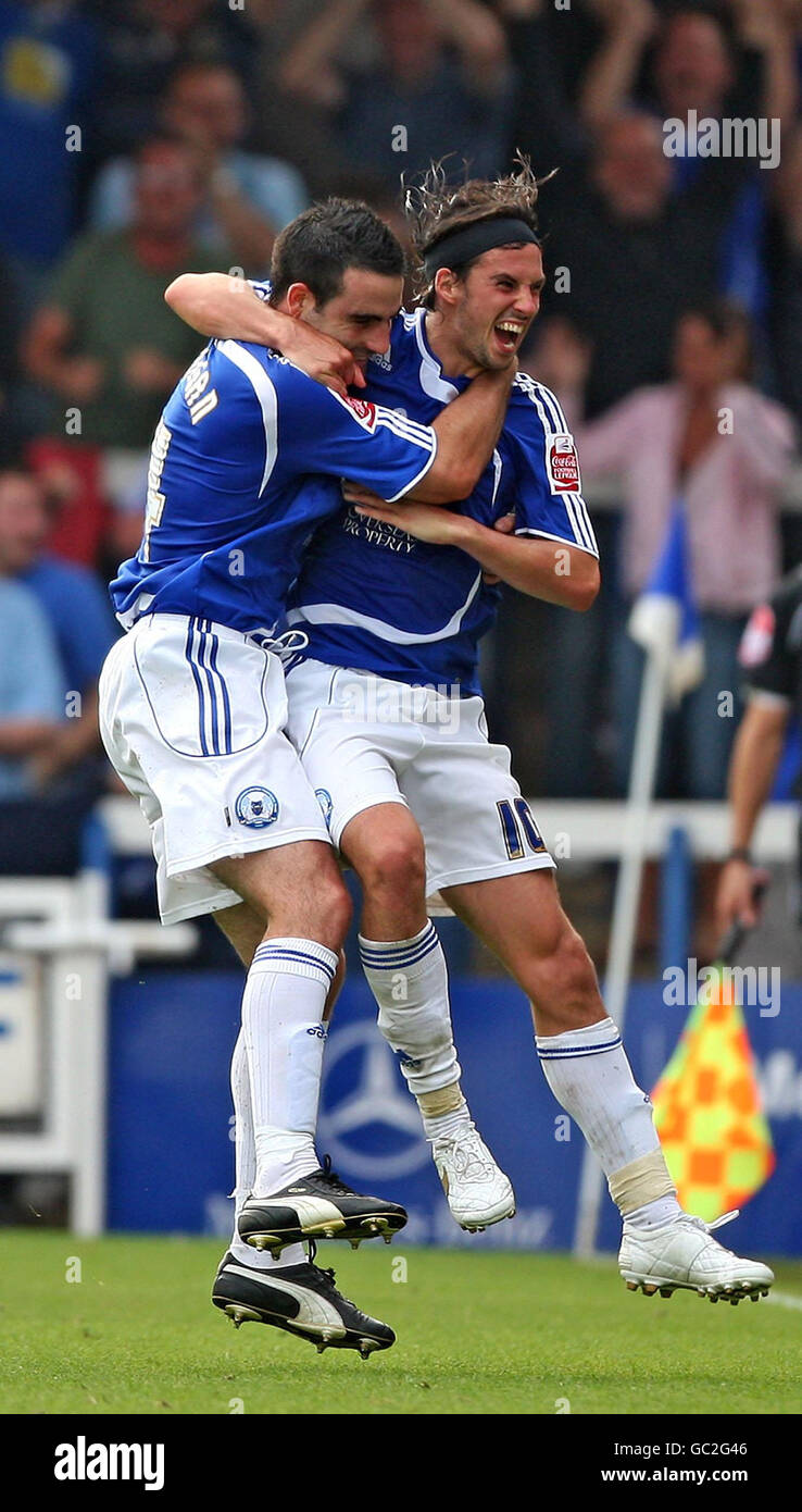 Peterborough's George Boyd (r) celebrates his goal with team mate ...