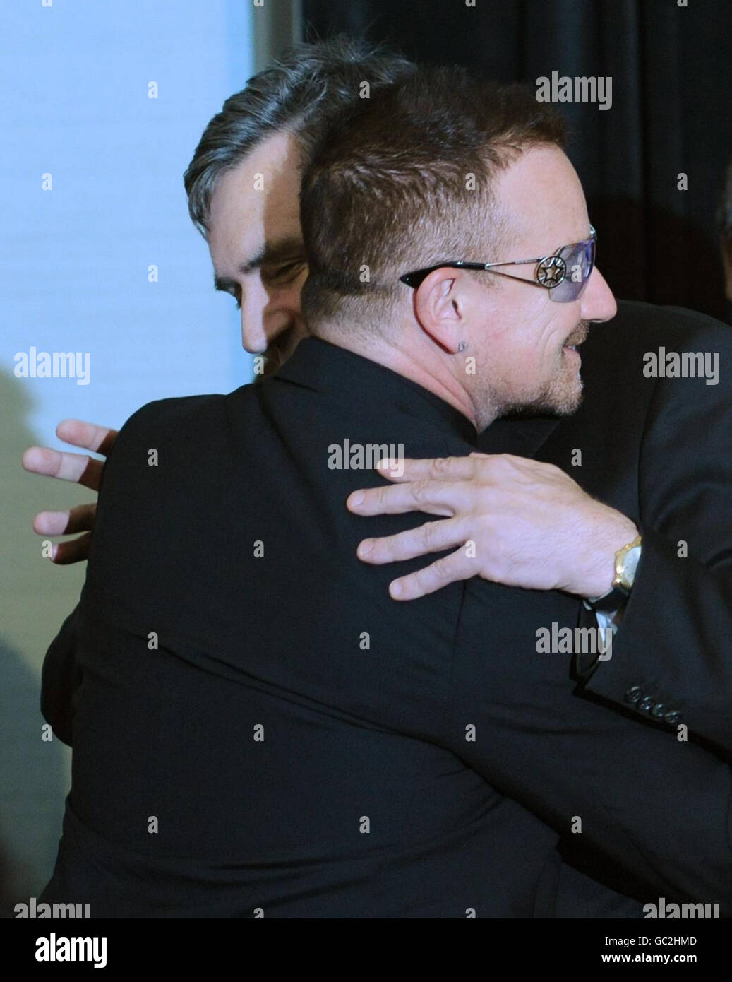 Prime Minister Gordon Brown meets the singer Bono at an event in New ...