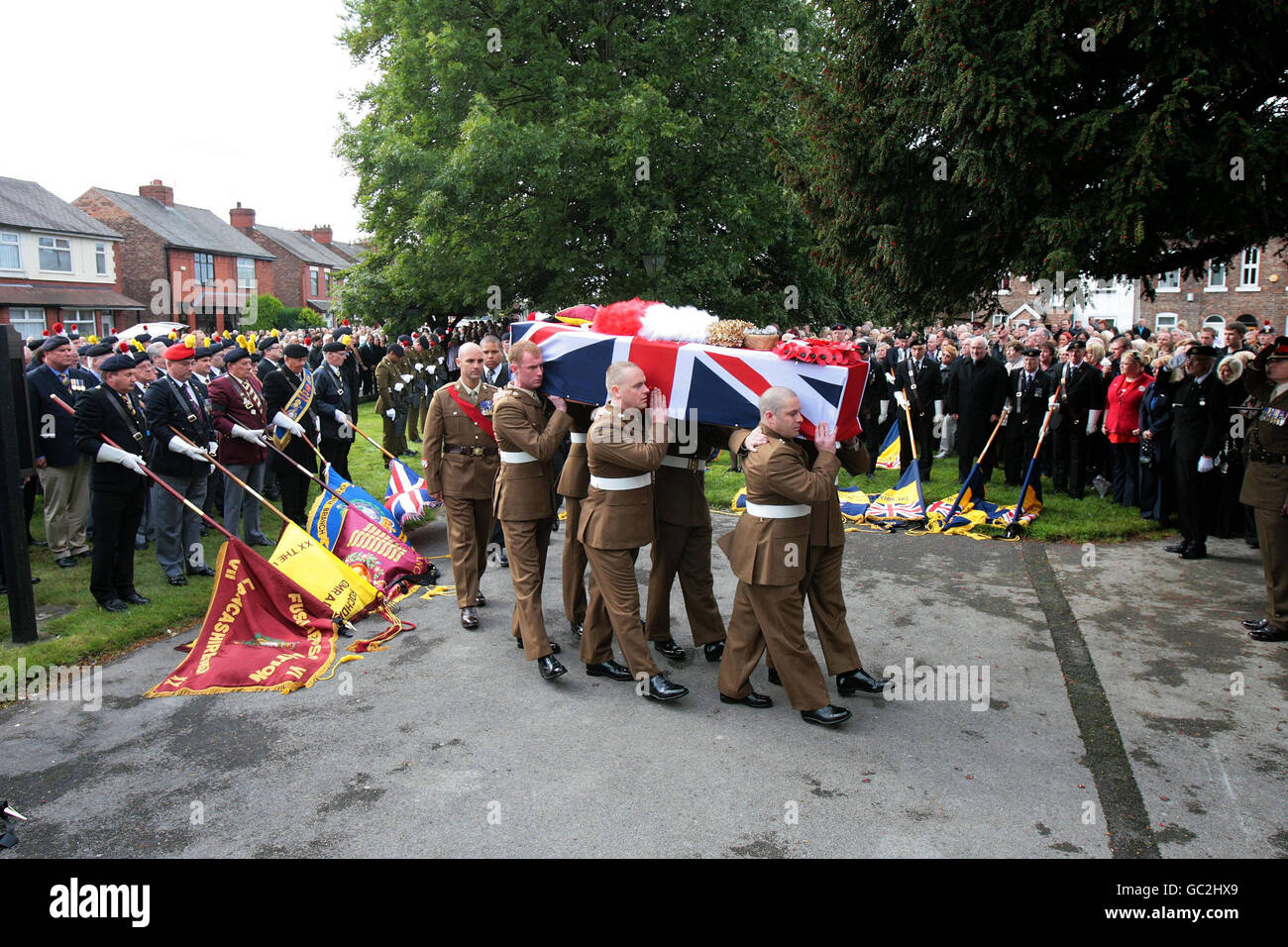 The coffin of Fusilier Simon Annis, 22, is carried into the church of ...