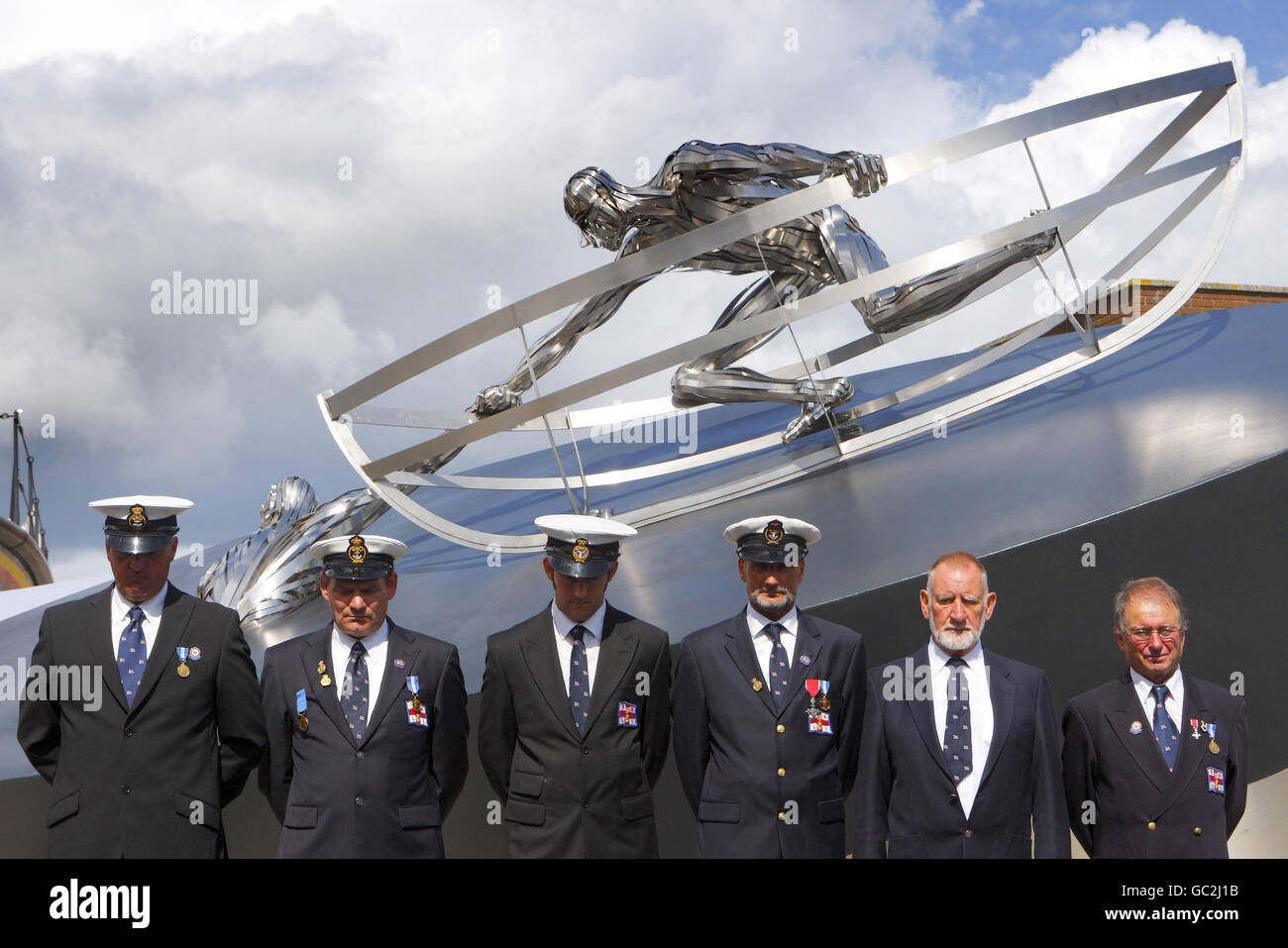 RNLI volunteers stand in silence as the Duke of Kent paid tribute to ...