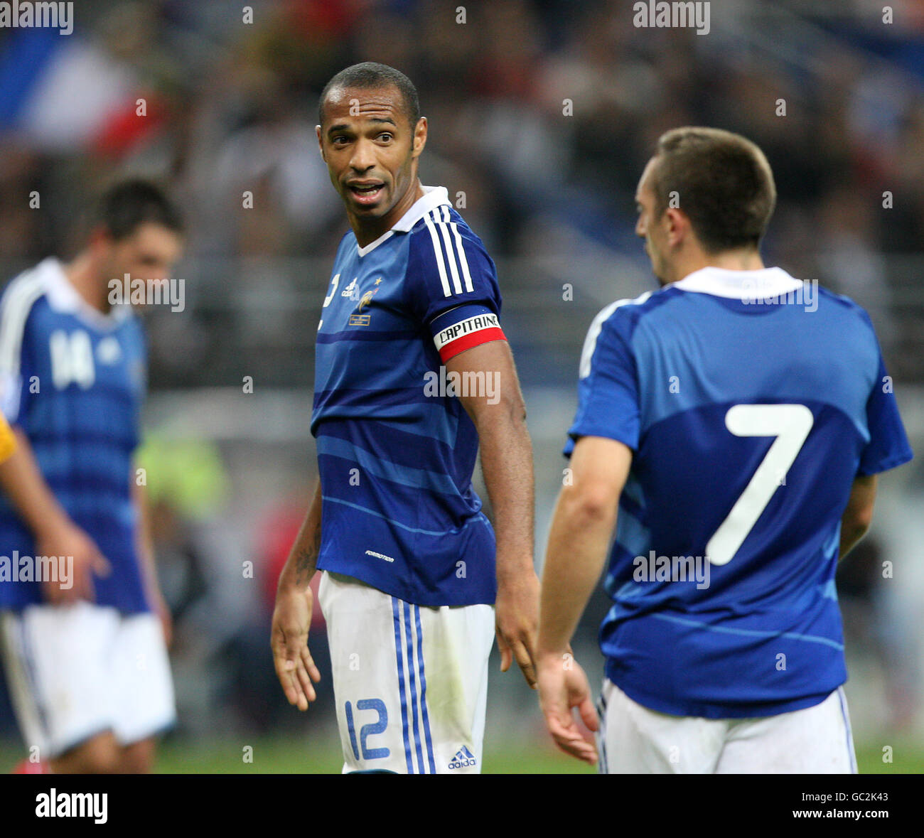 France's Thierry Henry reacts to team mate Franck Ribery Stock Photo ...