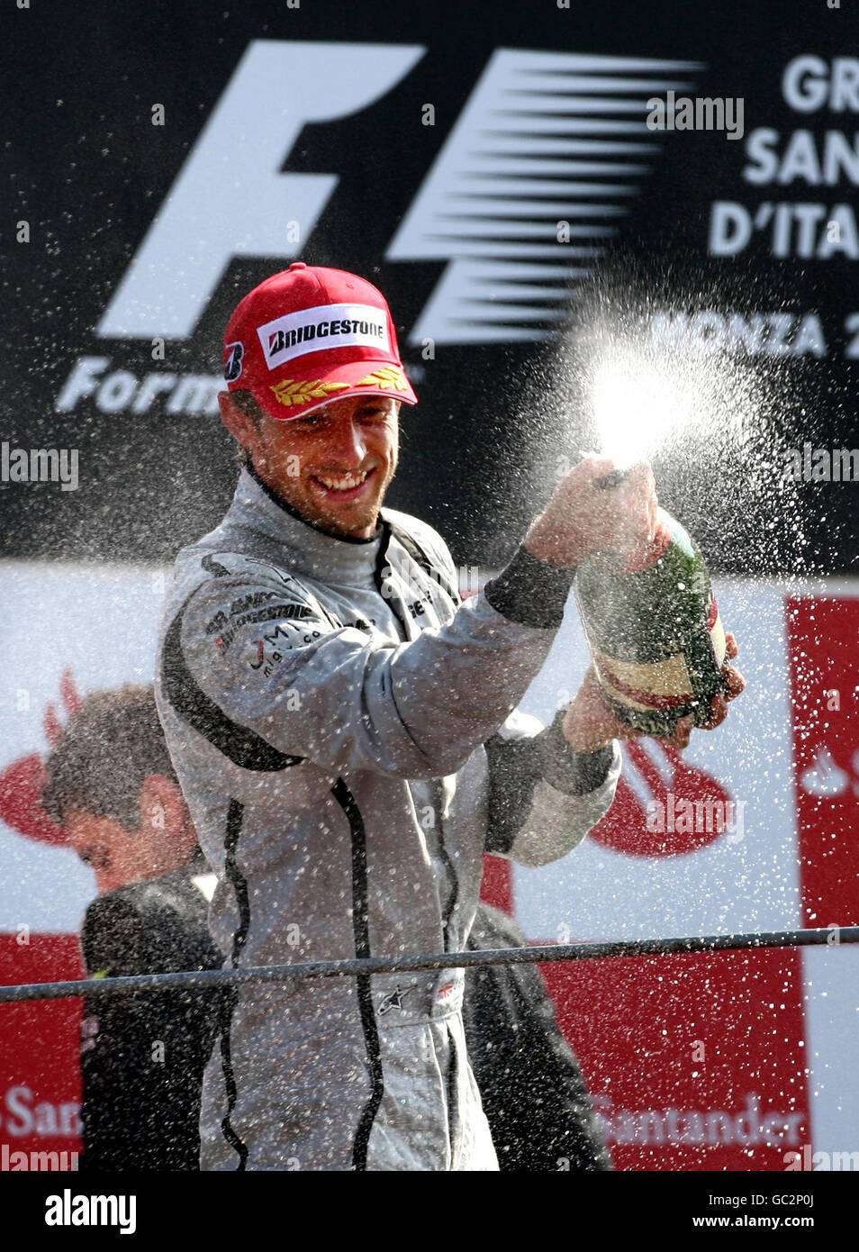 Brawn GP driver Jenson Button celebrates his second place at the Monza ...