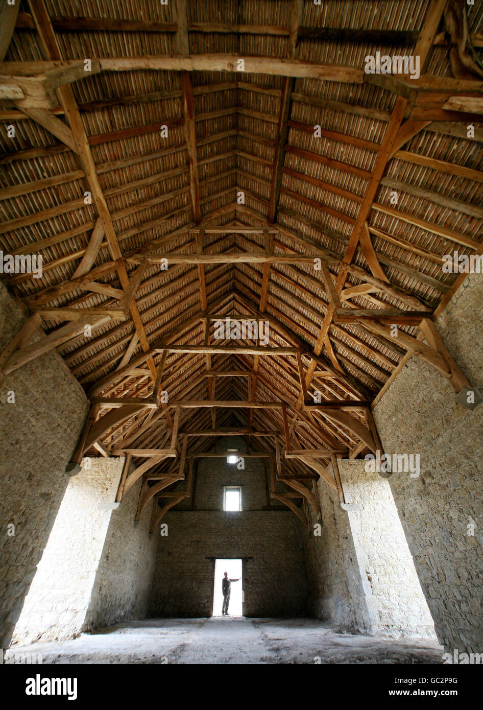 Graham Forge, director of G Forge Ltd, in an Elizabethan barn with a ...