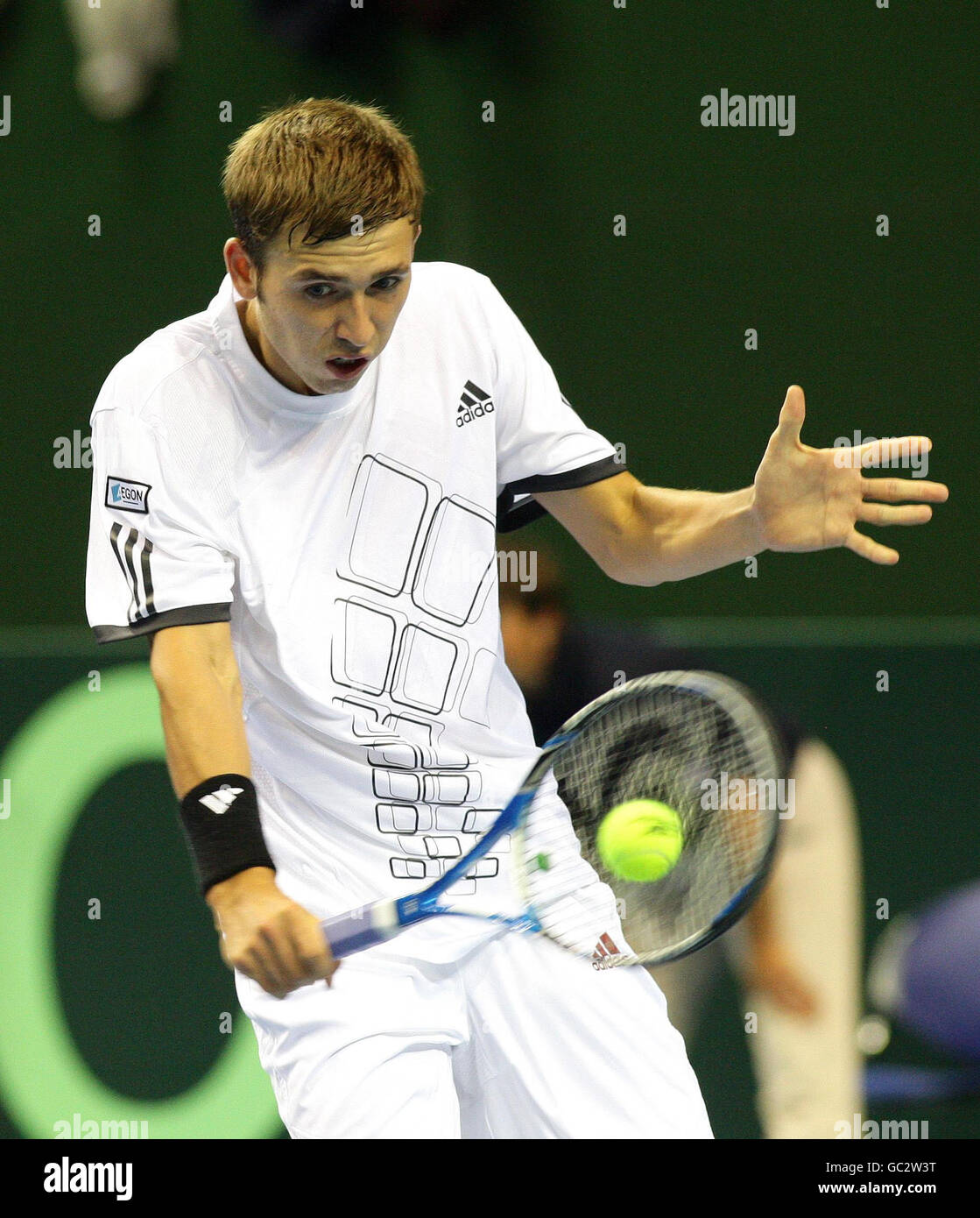 Great Britain's Daniel Evans in action against Jerzy Janowicz of Poland ...