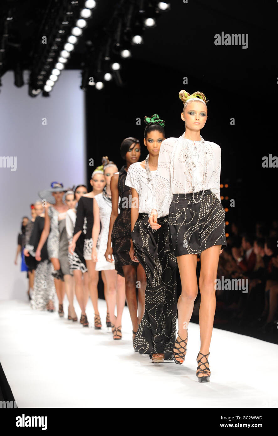 Models on the runway at the Issa Catwalk Show during the 25th London ...