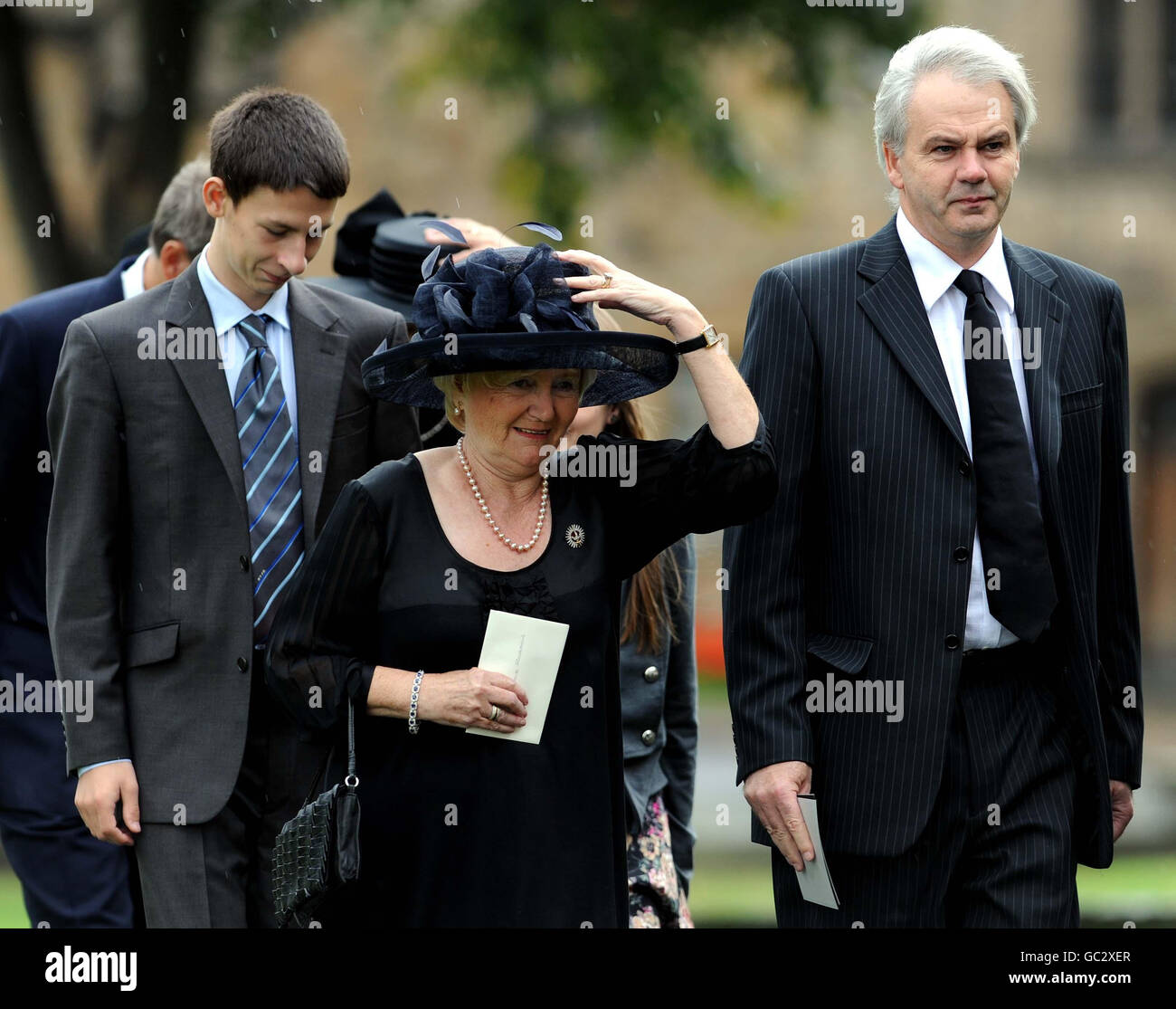 Lady Elsie Robson and her son Andrew (right) arrive for the Sir Bobby ...