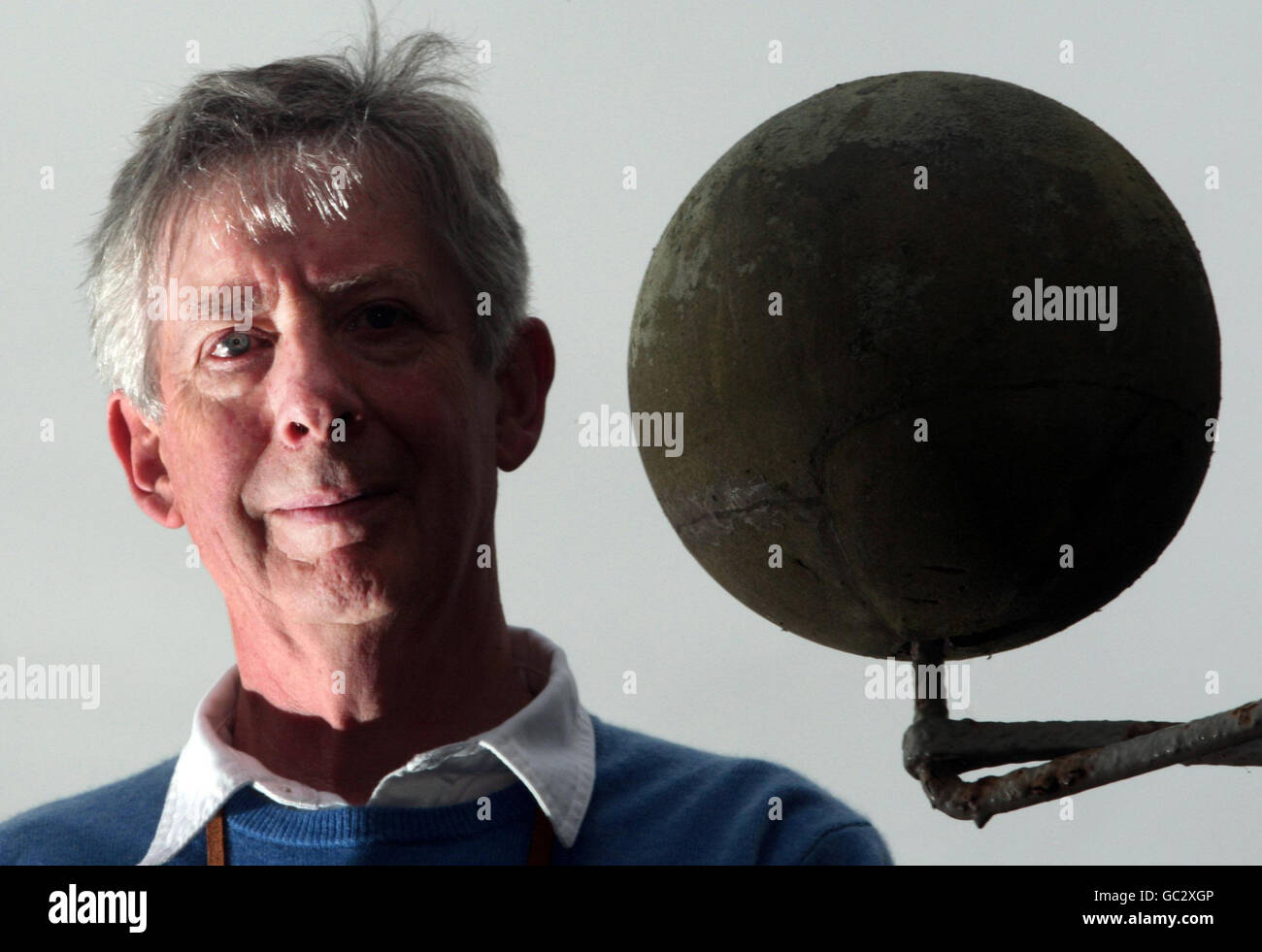 Chris Veitch poses with his stone model of the great comet of 1811 or ...