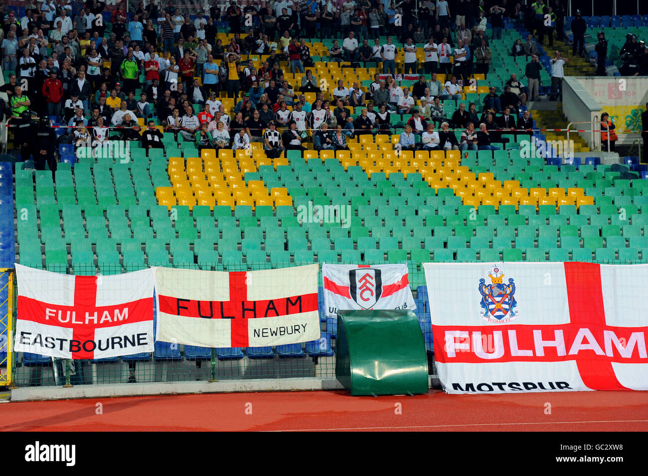 Fulham fans cheer on their side in the stand hi-res stock photography ...