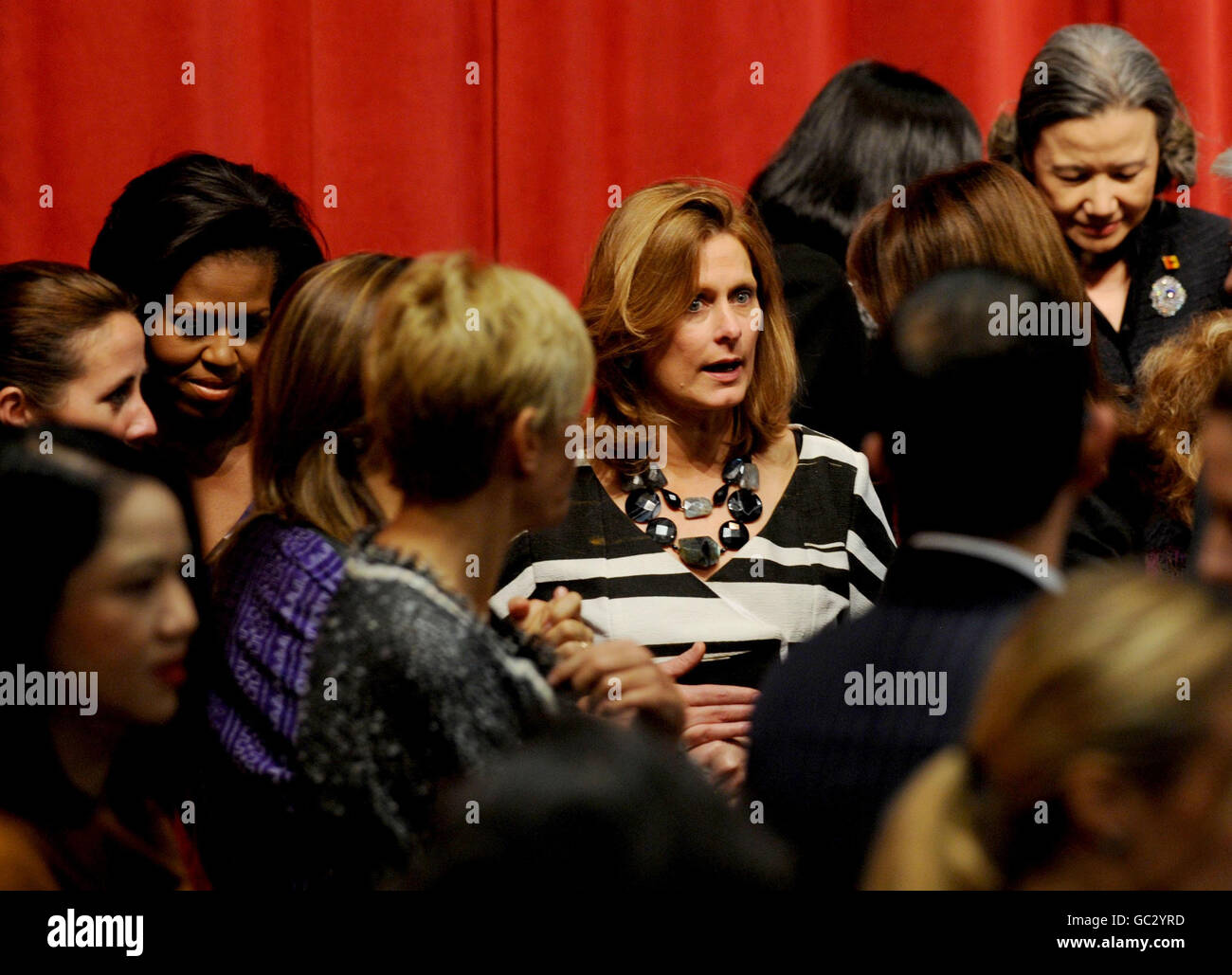 Britain's Prime Minister Gordon Brown's wife Sarah speaks with spouses ...