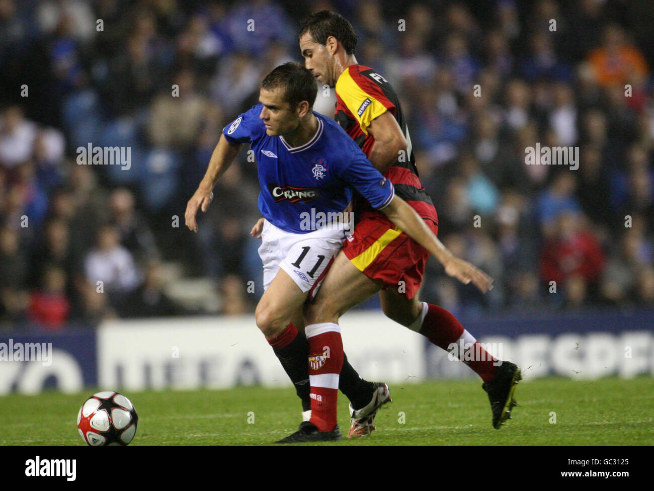 Sevilla's Lolo and Rangers' Jerome Rothen during the UEFA Champions ...