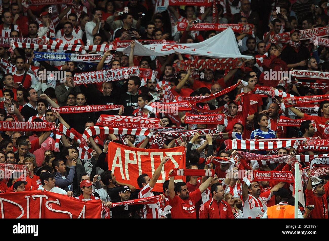 Emirates stadium olympiakos fans in the stands hi-res stock photography ...