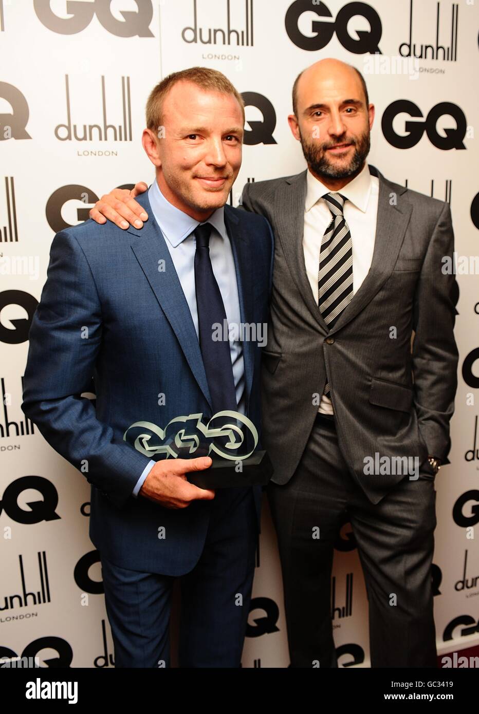 Guy Ritchie with his Film-Maker award and Mark Strong (right) at the ...