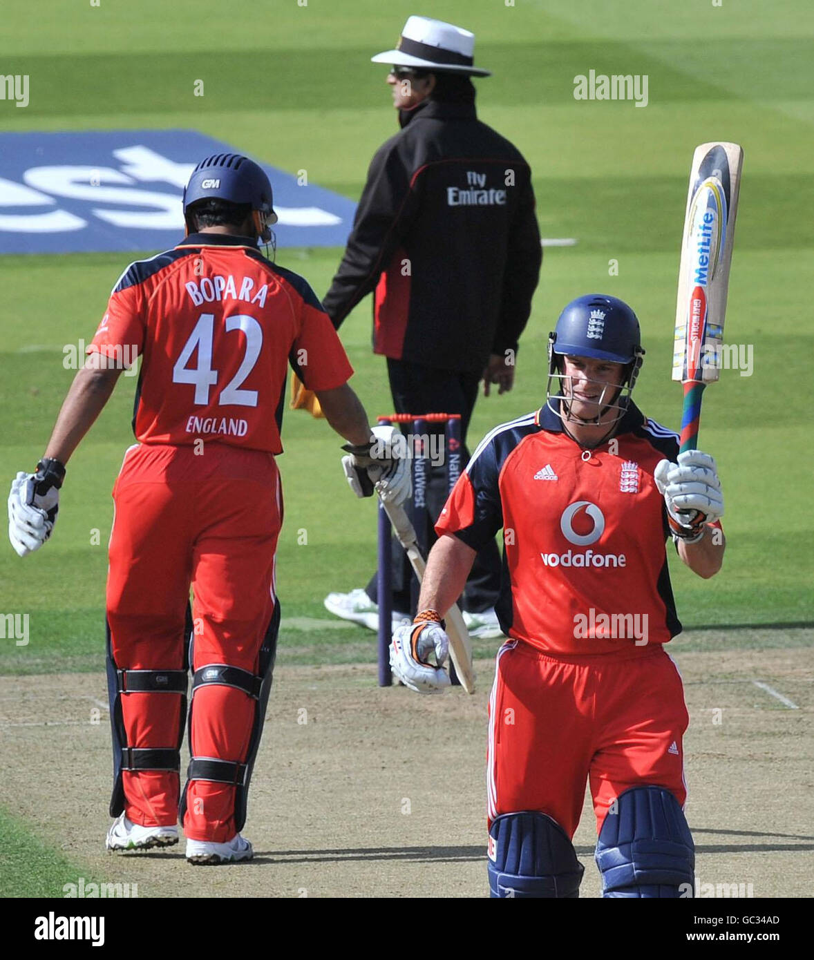 Cricket batsman raising bat hi-res stock photography and images - Alamy