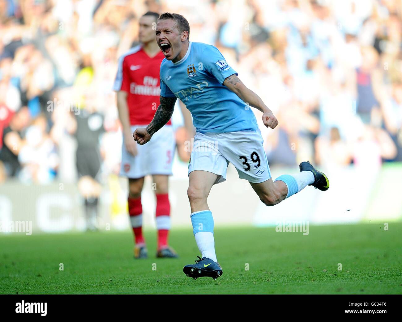 Manchester City's Craig Bellamy celebrates scoring his sides second ...