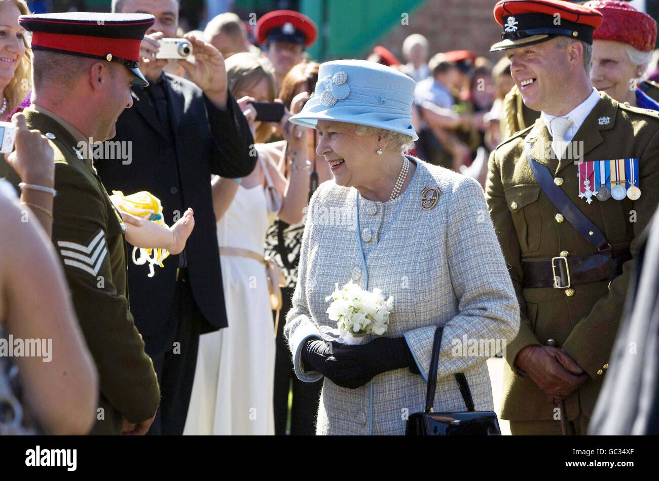 Britain's Queen Elizabeth II meets friends and relatives during her ...