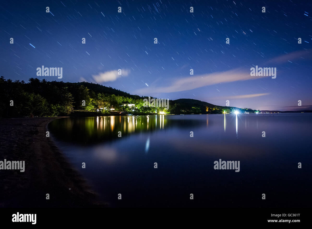 Long exposure of stars moving over Lake Winnipesaukee at night, at ...