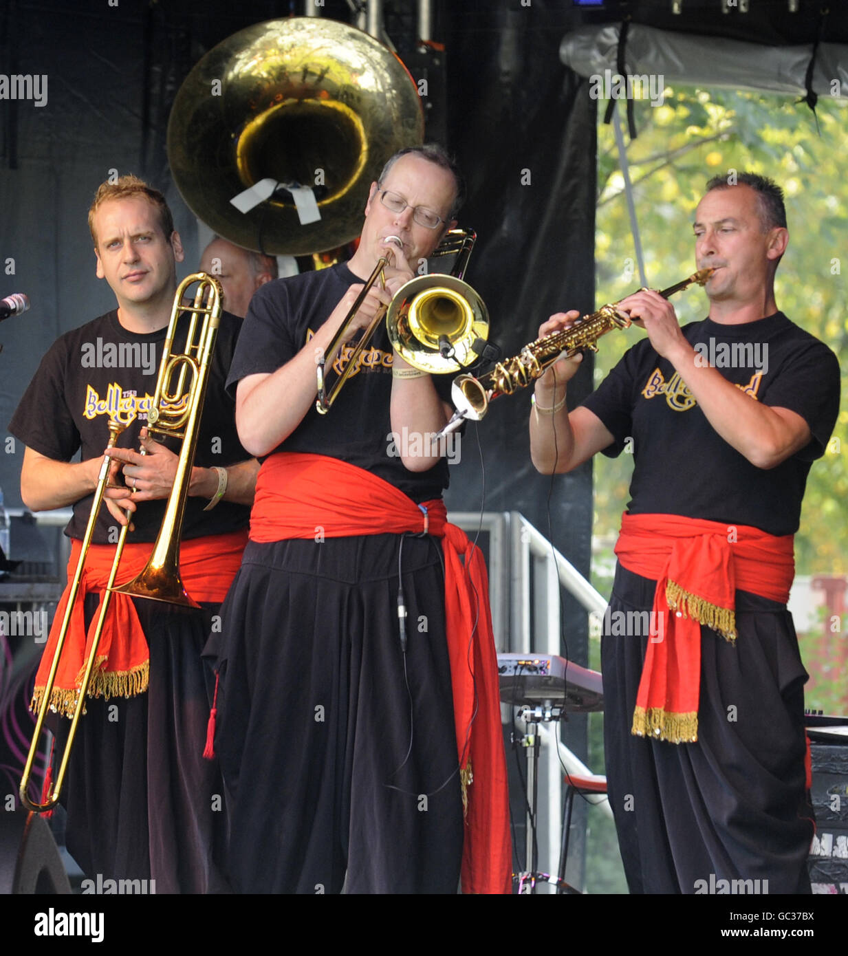 Dave Jago (centre) and Mark Allen (right) of Bollywood Brass Bandduring ...