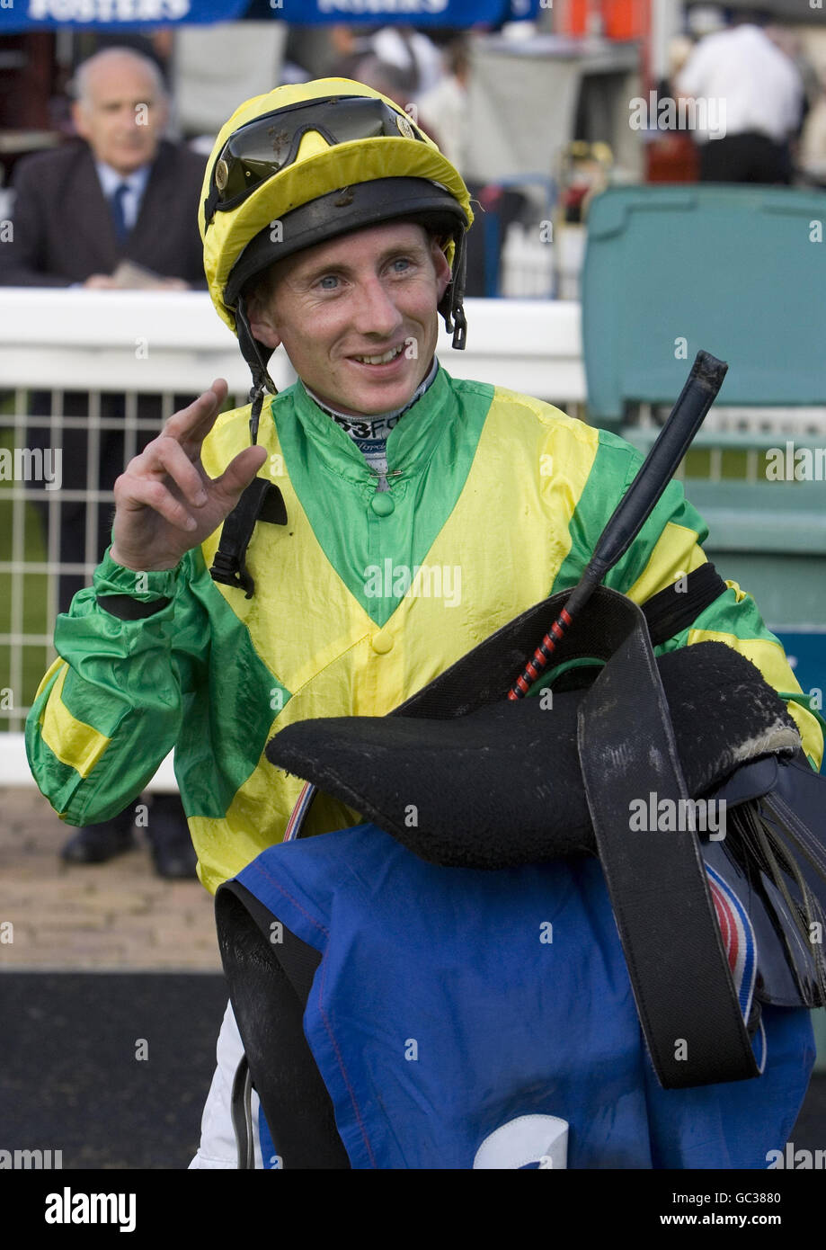 Jockey paul hanagan celebrates after winning his third race hi-res ...