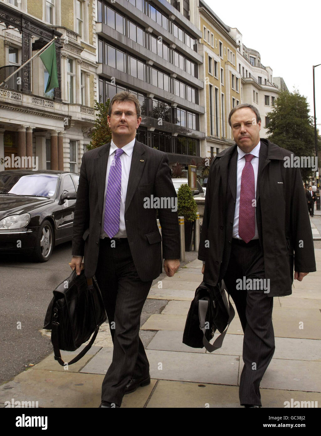 Jeffrey Donaldson MP (left) and Nigel Dodds MP leave the Libyan Embassy ...