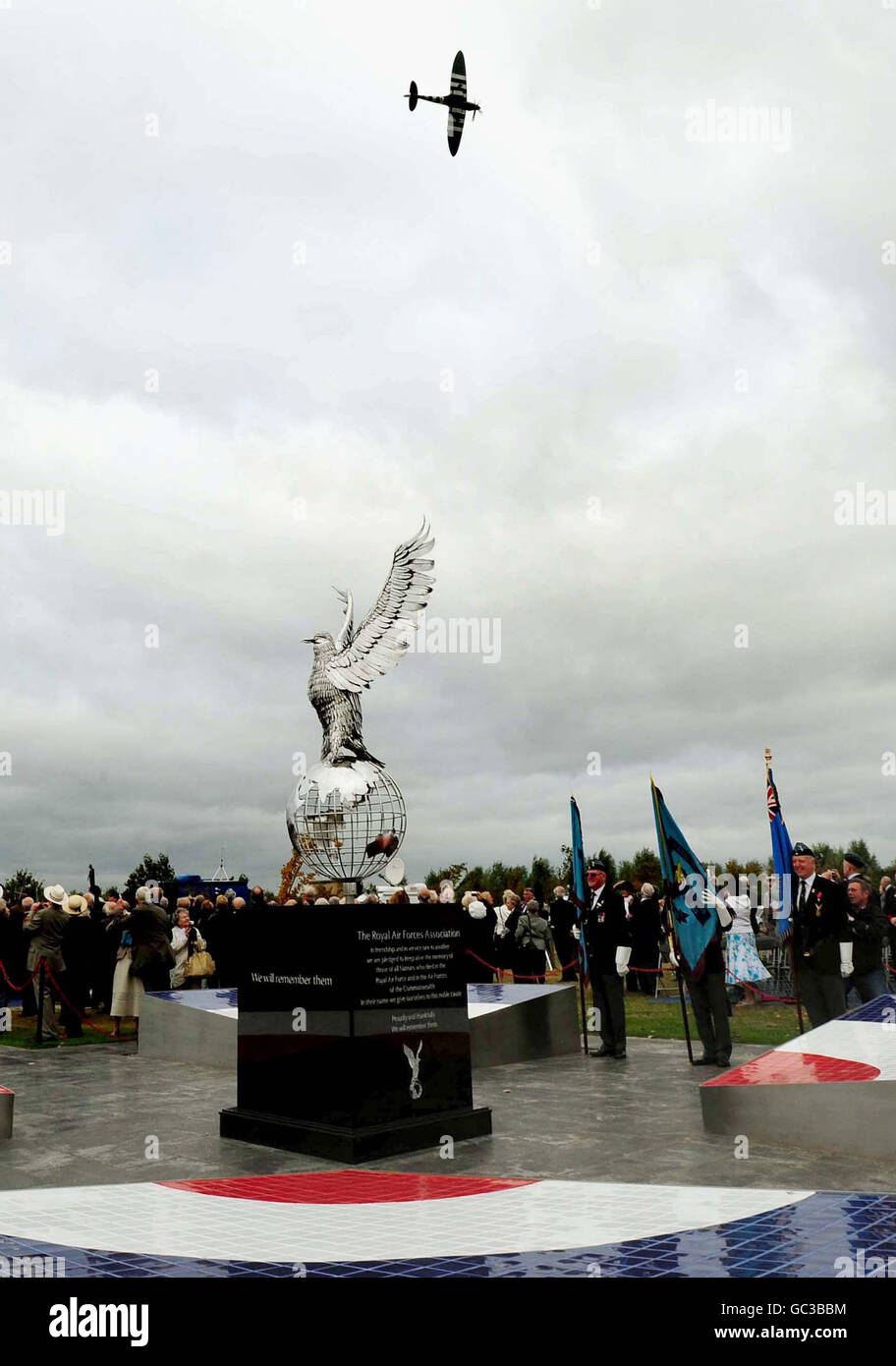 A spitfire performs a flypast during the opening of the first National ...