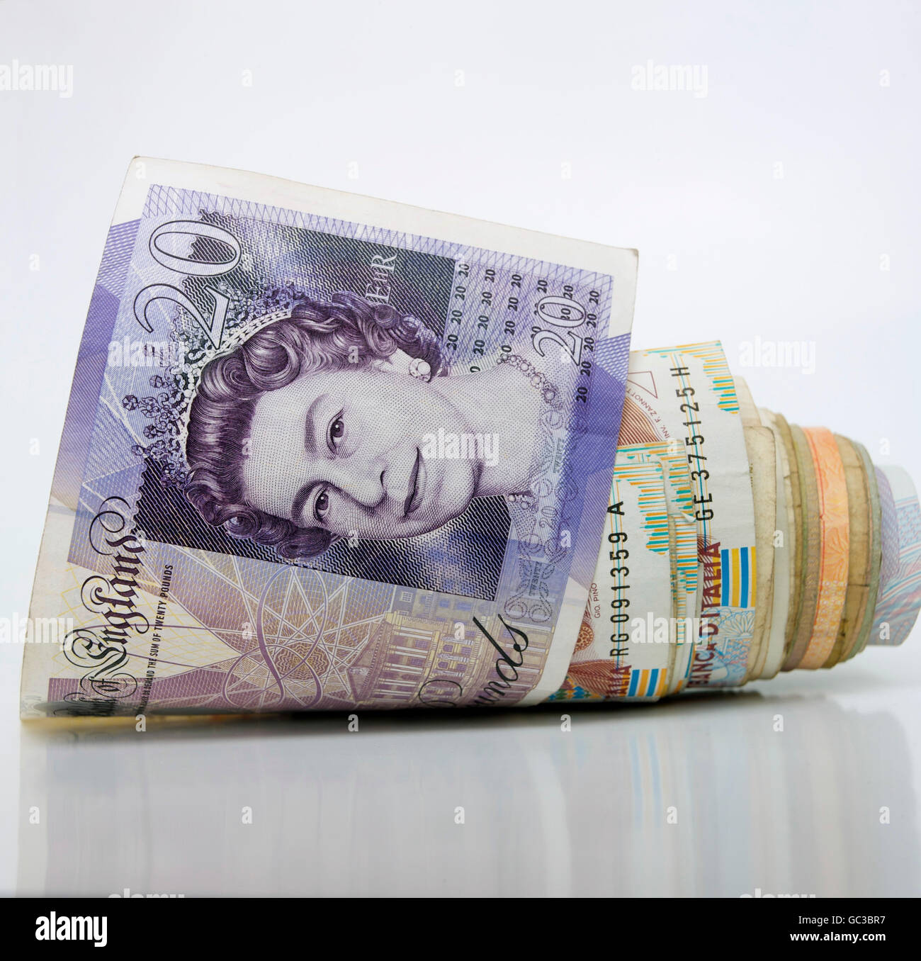 Rolled bunch of banknotes, Pound sterling Stock Photo - Alamy