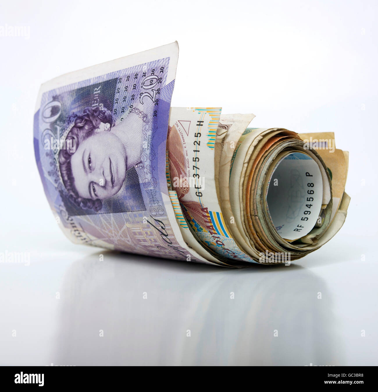 Rolled money notes uk hi-res stock photography and images - Alamy