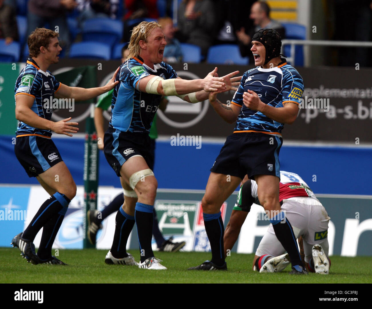 Cardiff Blues' Tom James (right) celebrates scoring the first try with ...