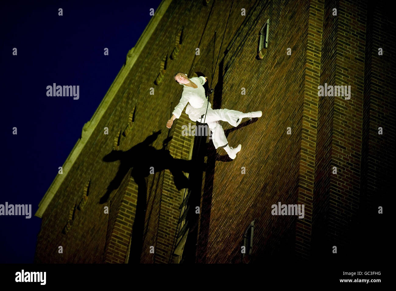 Dancer Kate Lawrence performs a vertical dance, as new illuminations ...